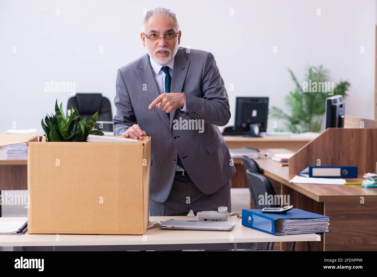 Old employee being fired from his work Stock Photo - Alamy