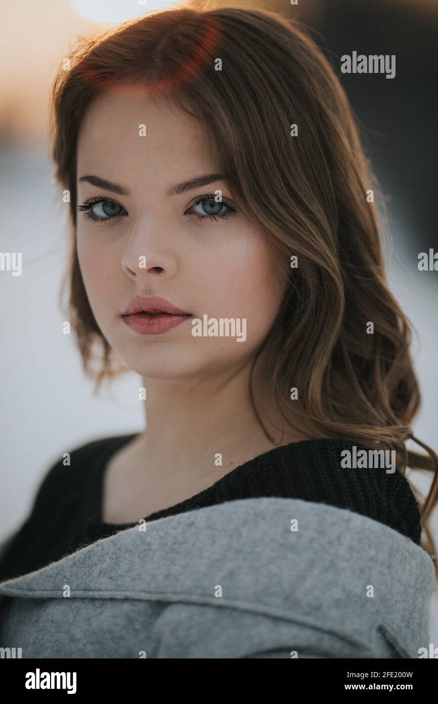 Young beautiful Bosnian woman with gray eyes posing during the sunset ...