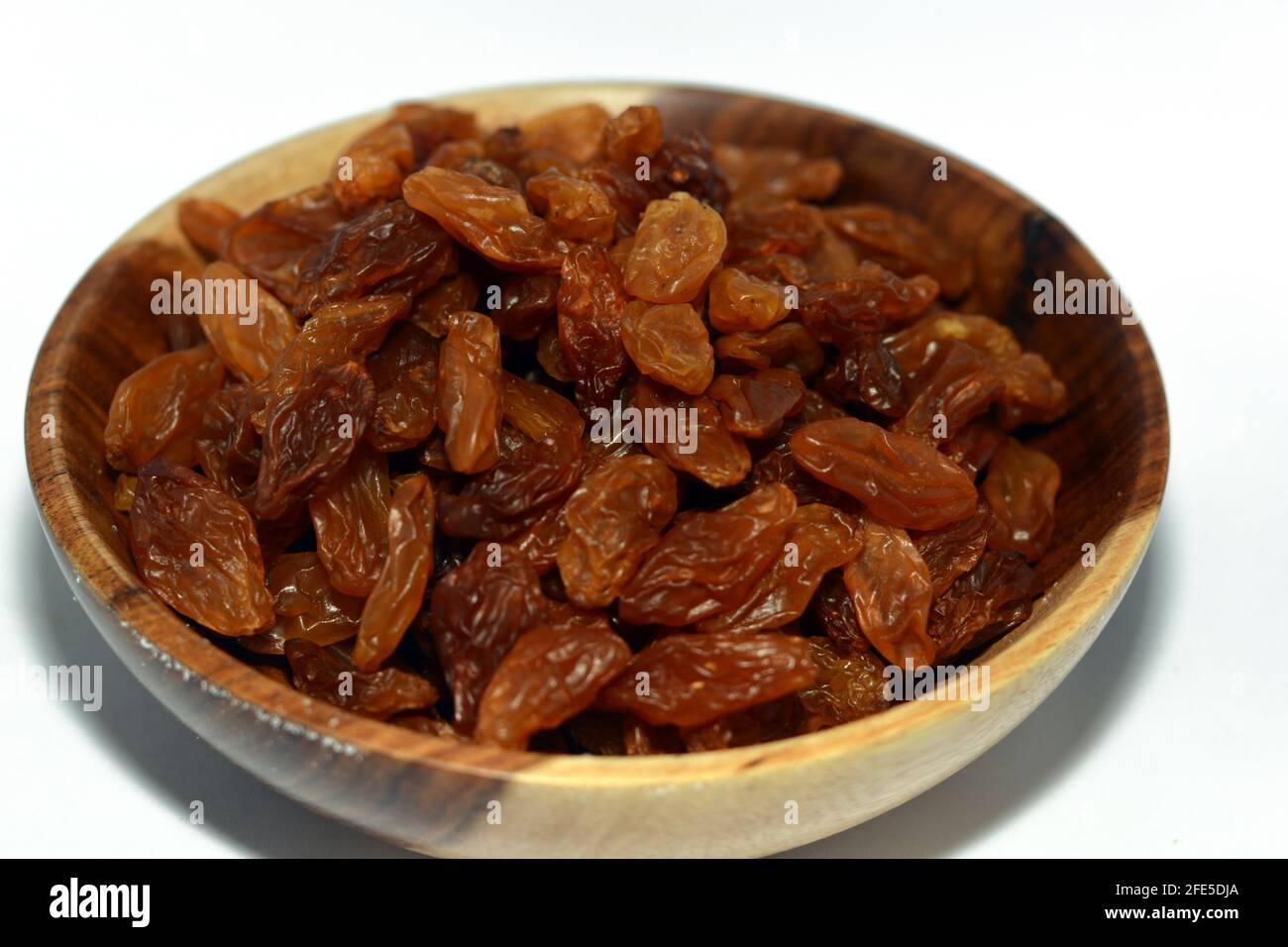 Dried raisins on white background, Egyptian raisins Stock Photo - Alamy