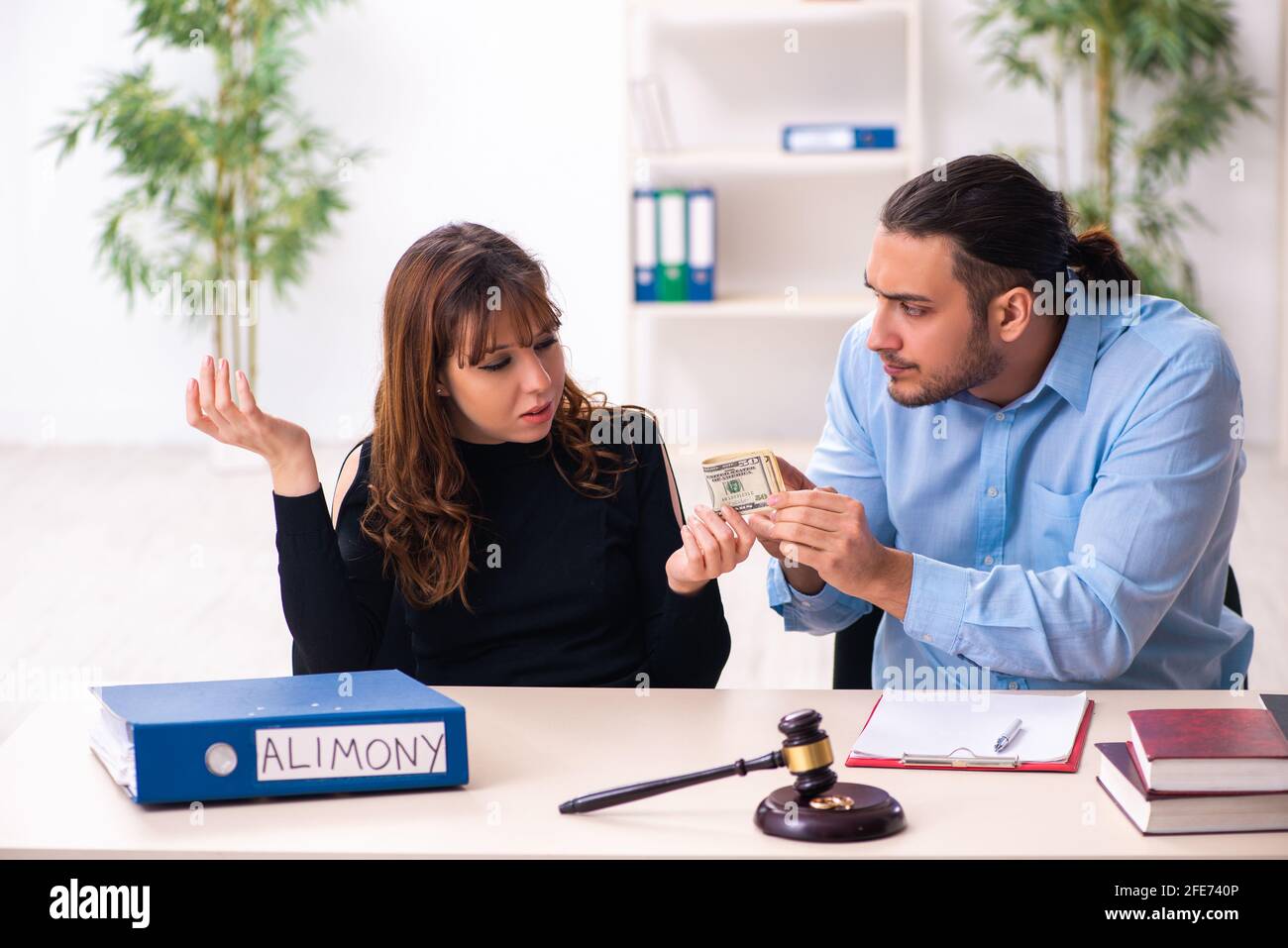 Couple divorcing in alimony concept Stock Photo - Alamy