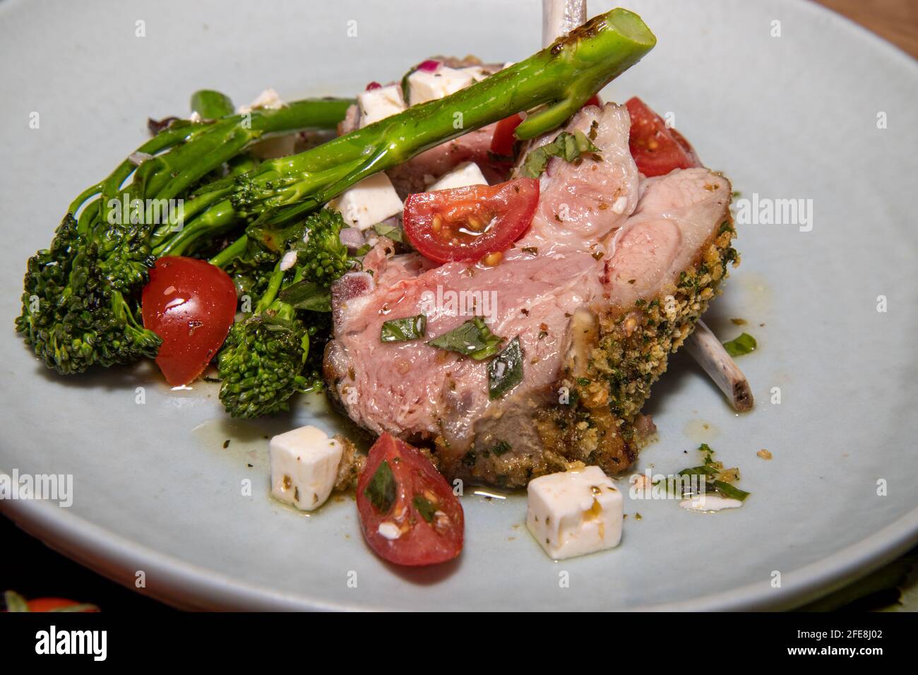 A delicious plate of Spring Lamb chops with spring vegetables Stock ...