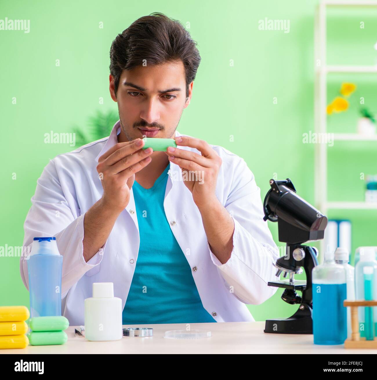 The chemist testing soap in the lab Stock Photo - Alamy