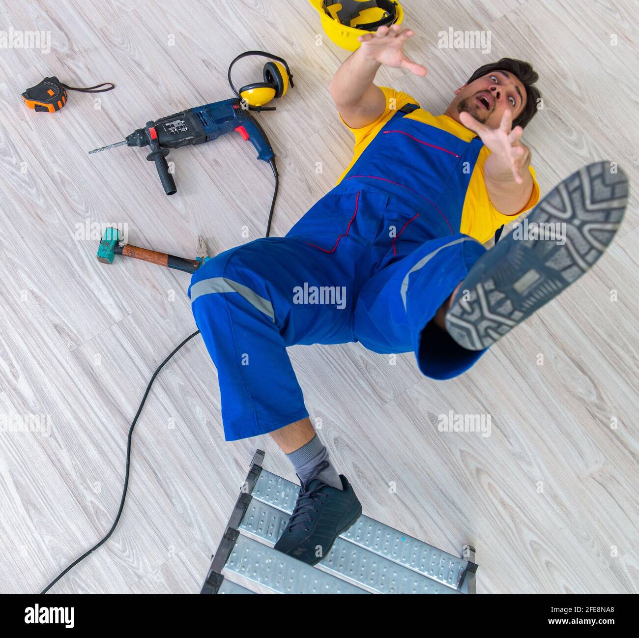 The injured worker at the work site Stock Photo - Alamy
