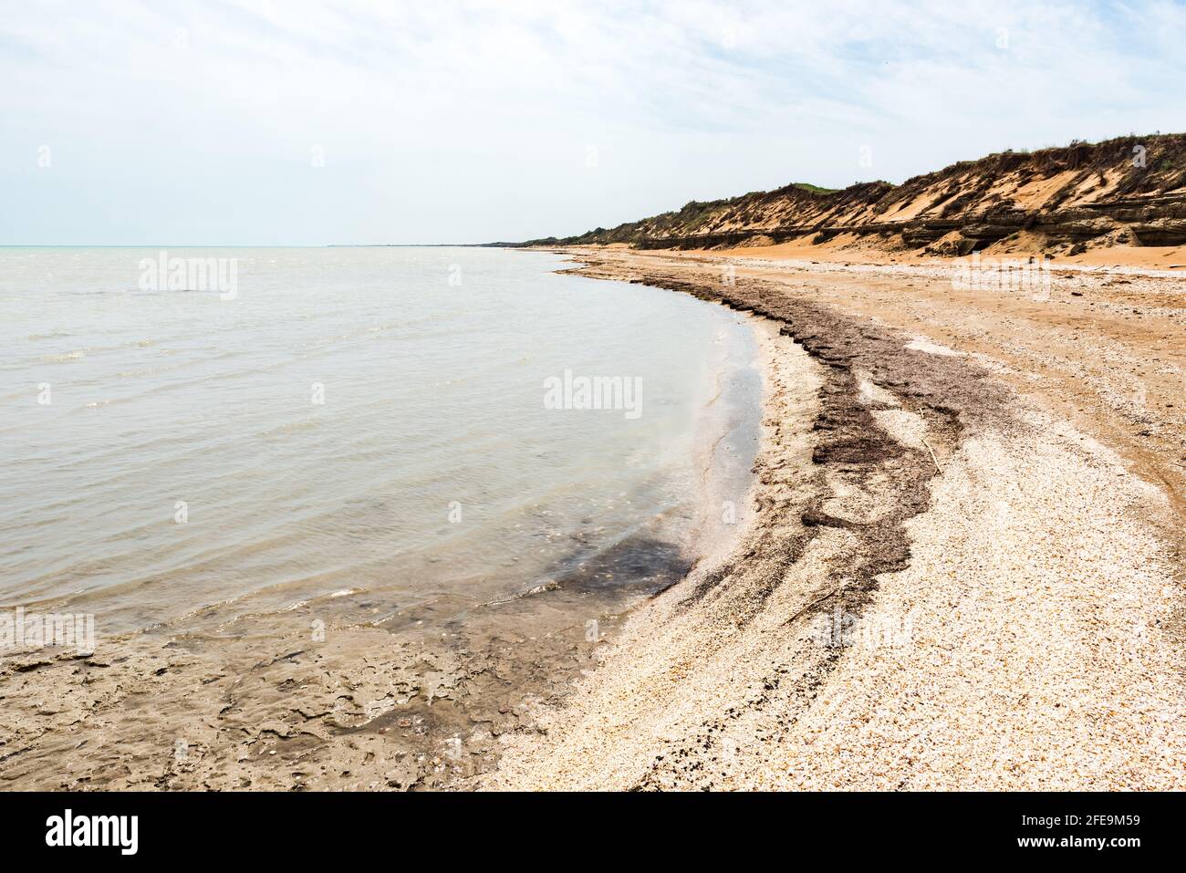 Empty sea beach in sunny weather Stock Photo - Alamy