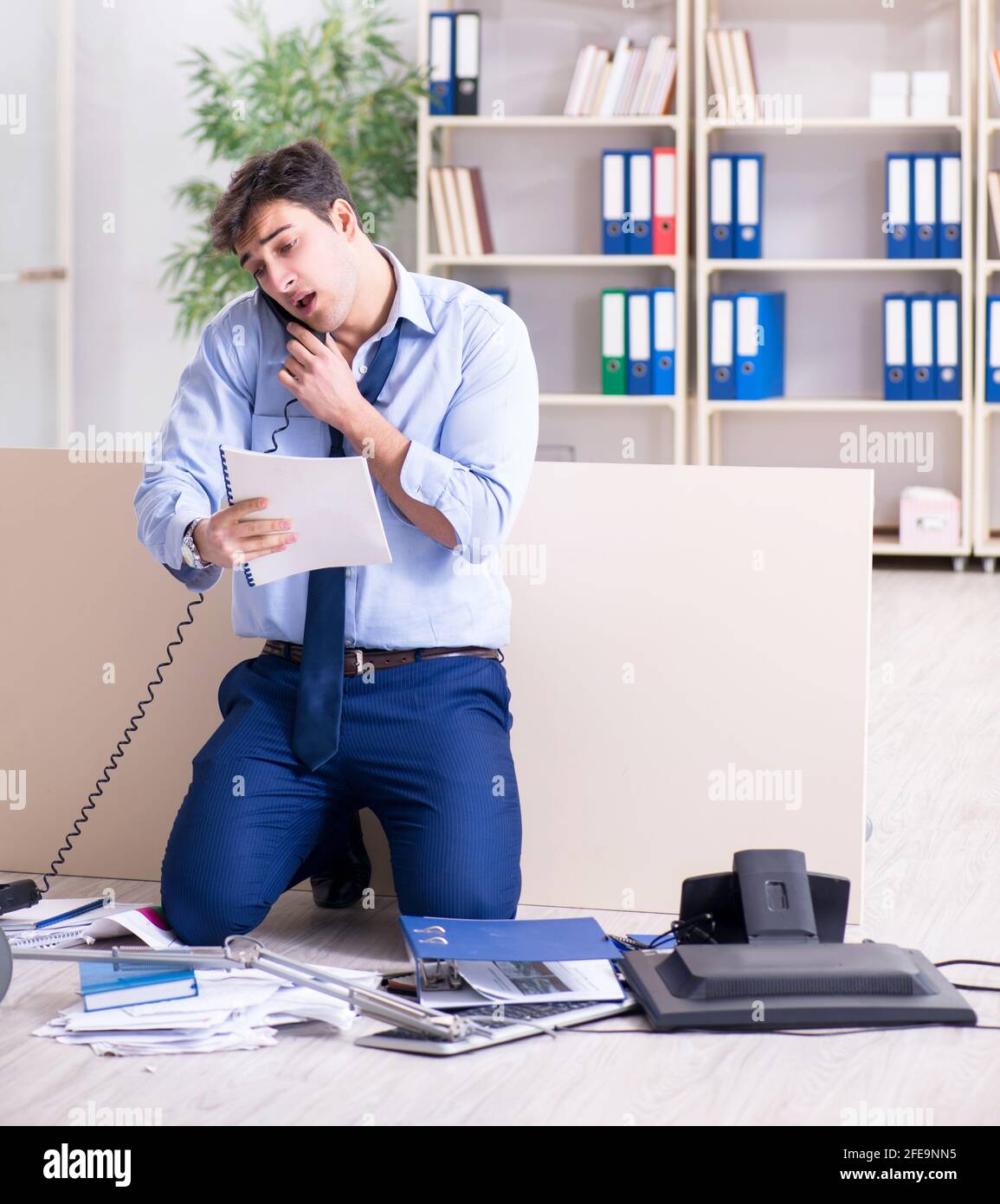 The businessman frustrated at many telephone calls Stock Photo - Alamy