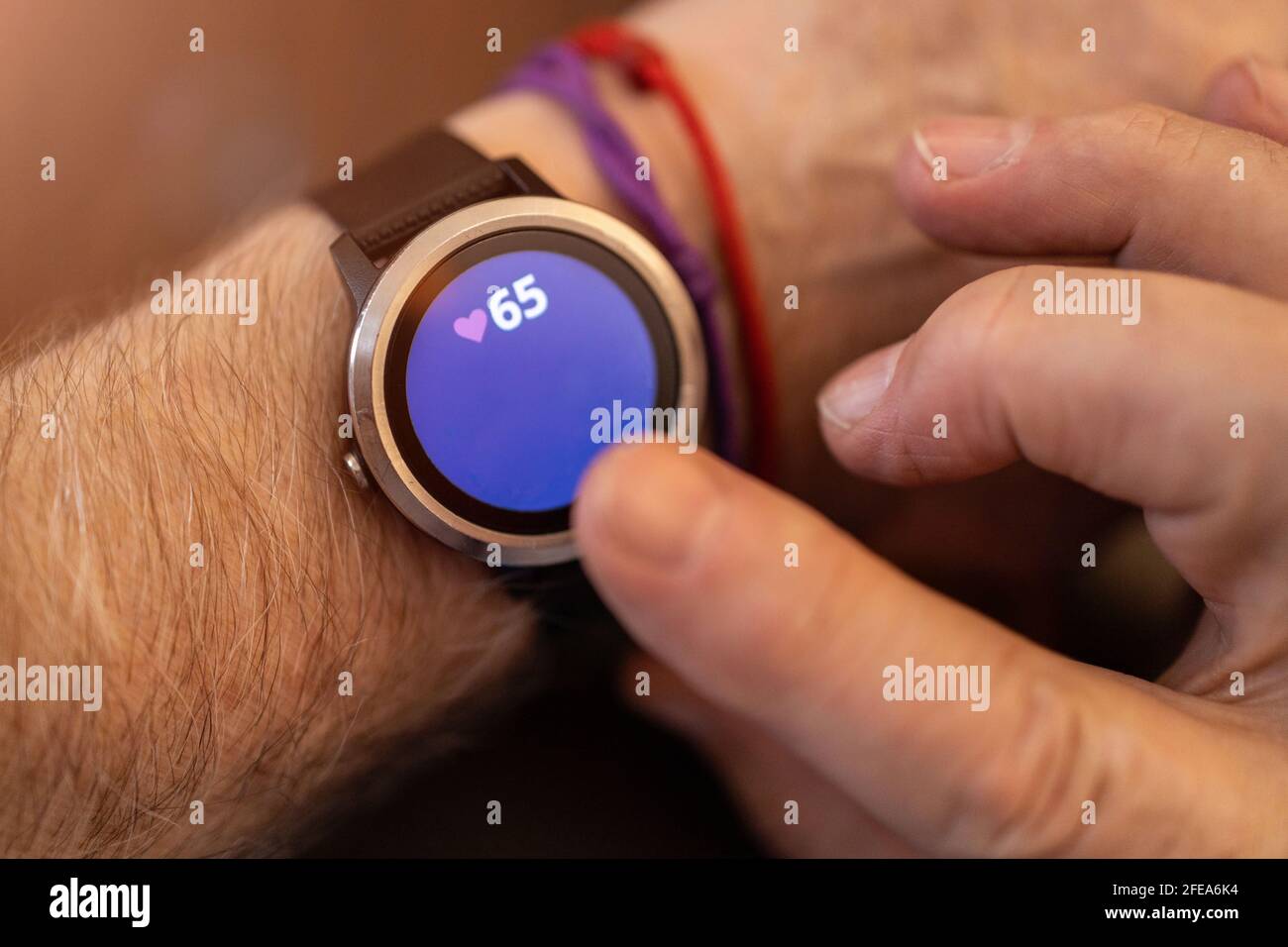 Elderly man hand and detail of the smartwatch Stock Photo - Alamy