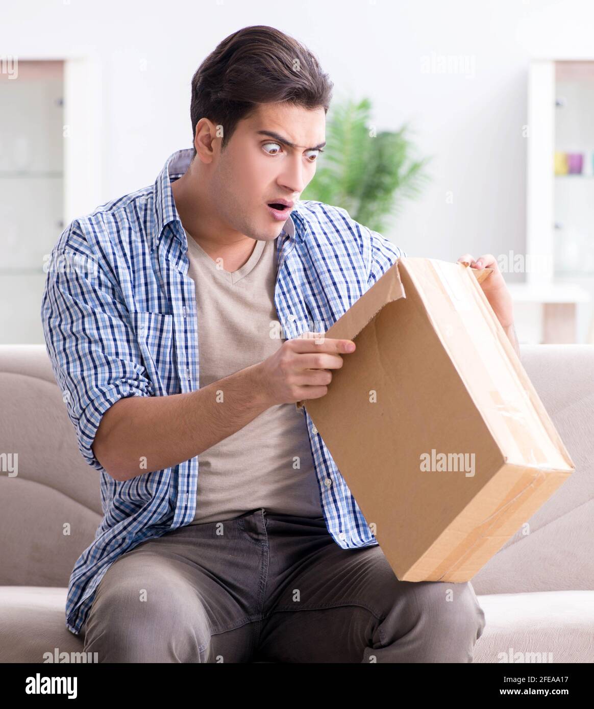 The man receiving empty parcel with stolen goods Stock Photo - Alamy