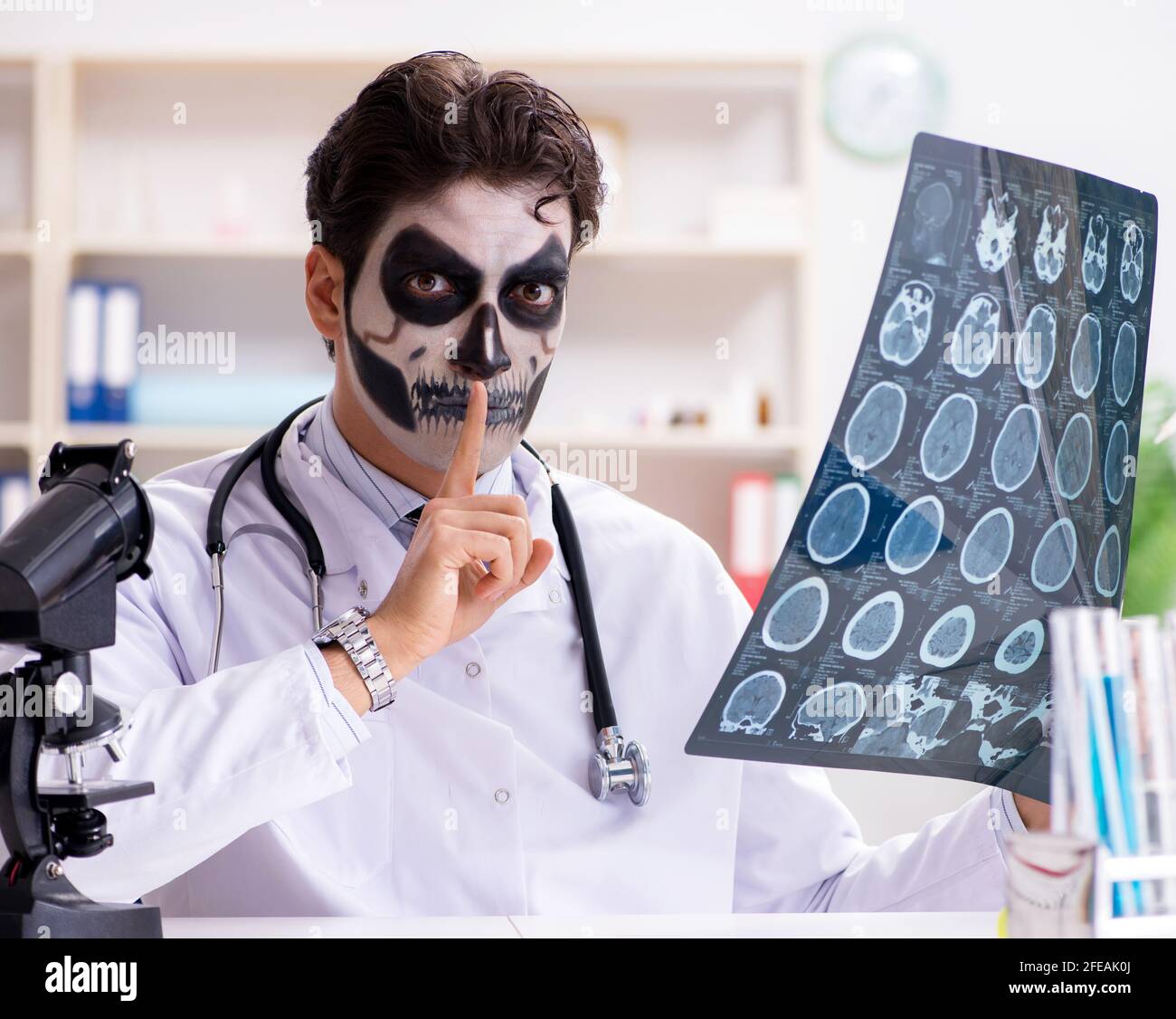 The scary monster doctor working in lab Stock Photo - Alamy