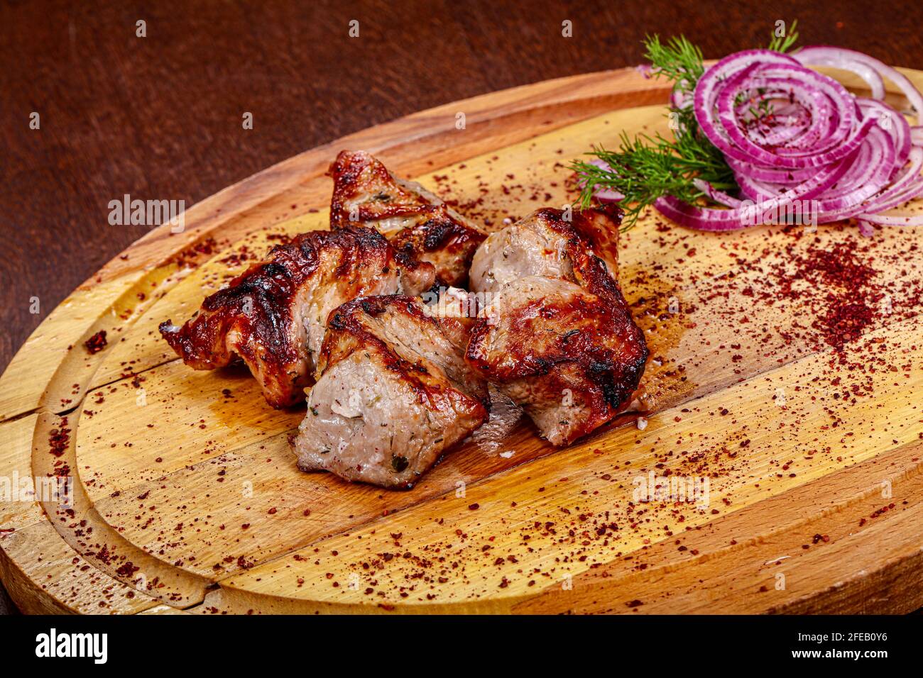 Caucasian traditional Pork shashlik served onion rings Stock Photo - Alamy