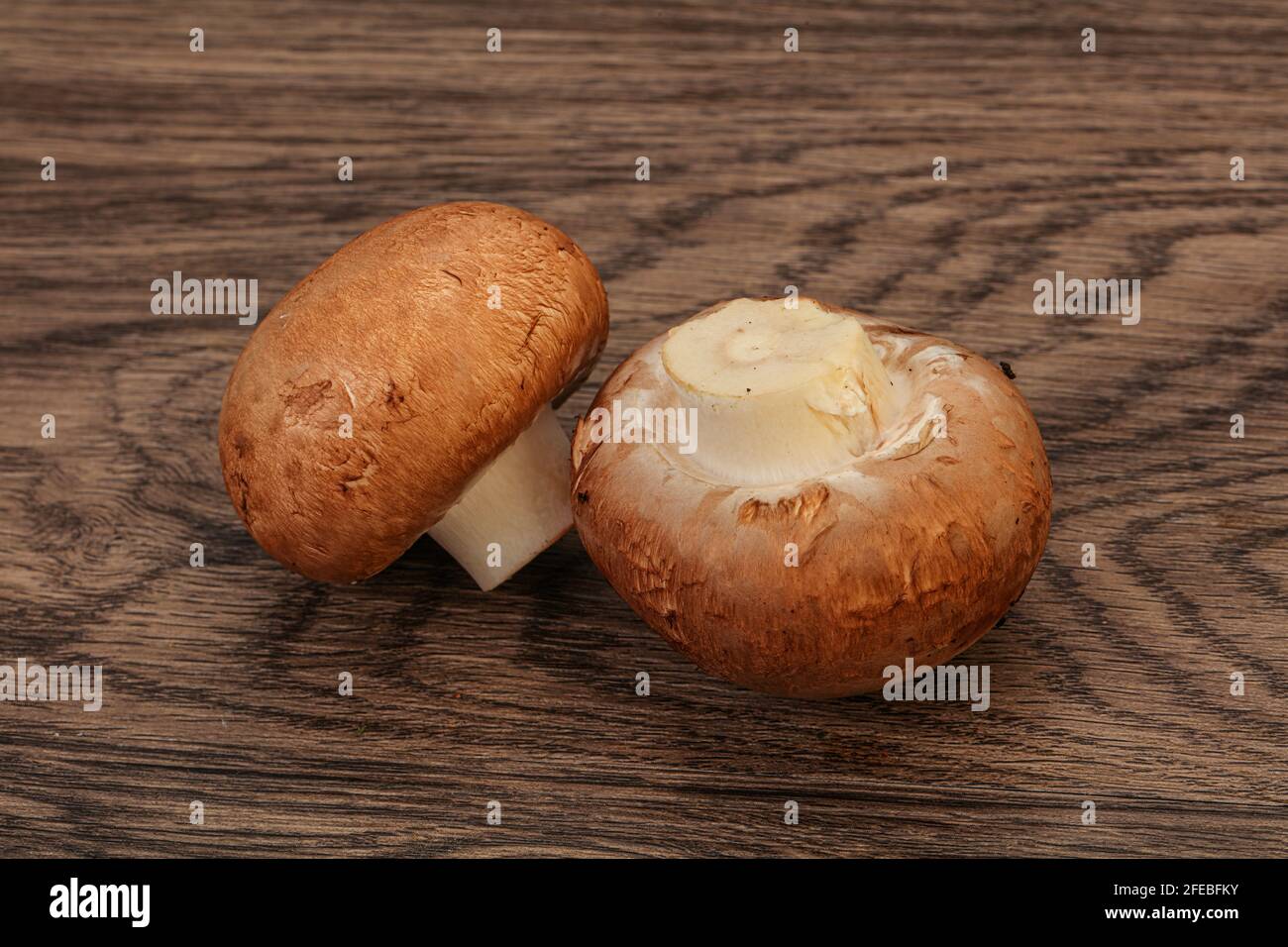 Tasty Raw Brown Champignons over background Stock Photo - Alamy