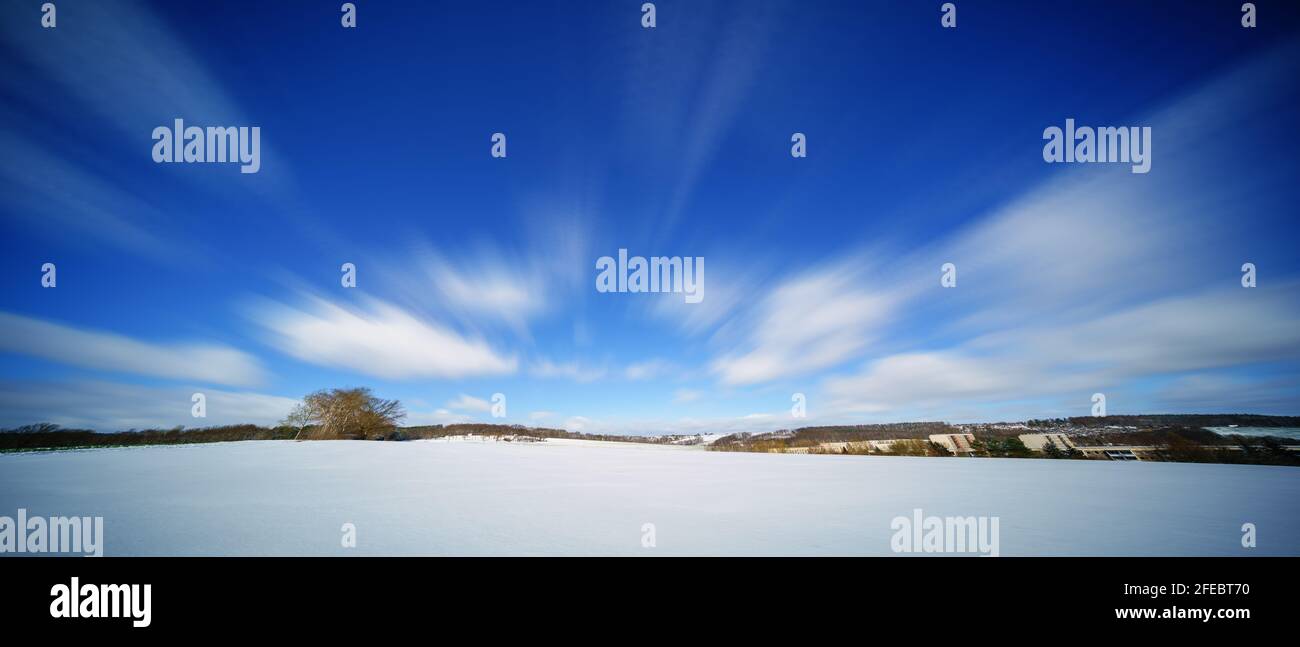 Long exposure winter snow field panorama with beautiful day sky Stock ...
