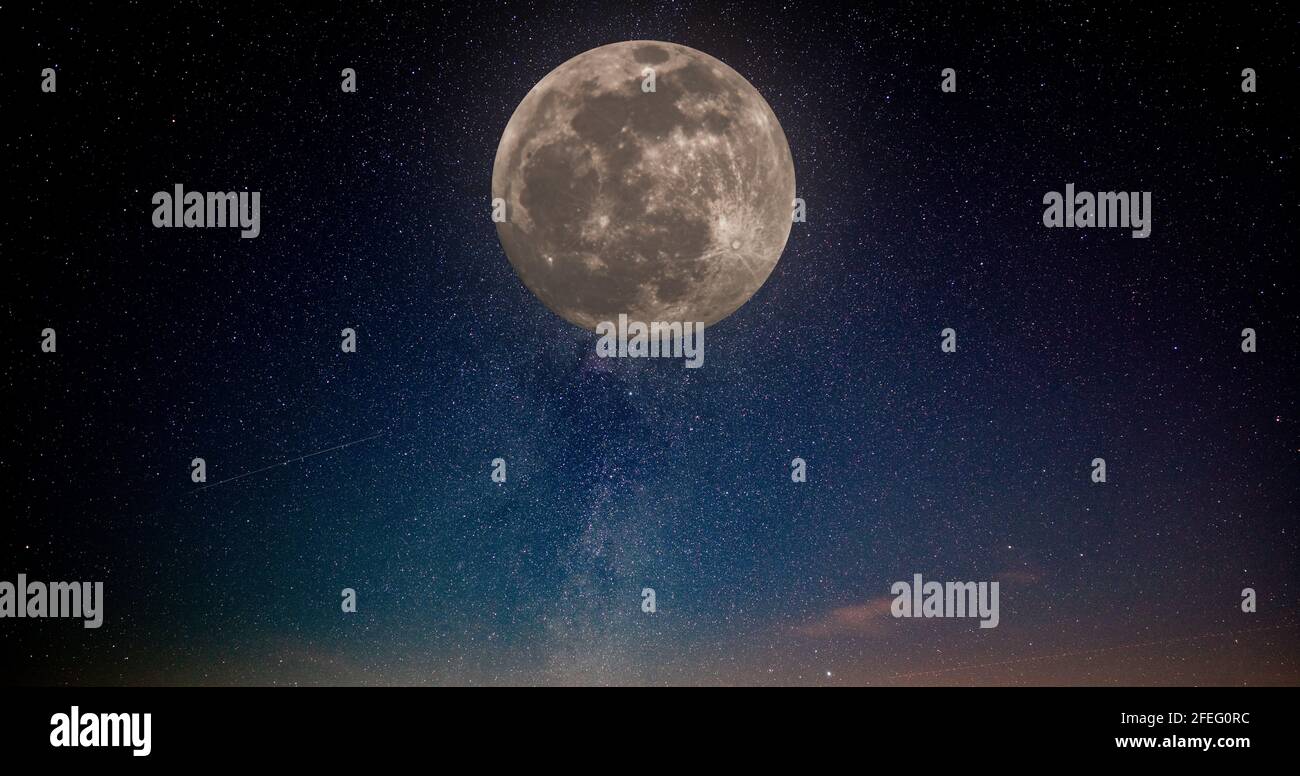 Full moon in the night starry sky Stock Photo - Alamy