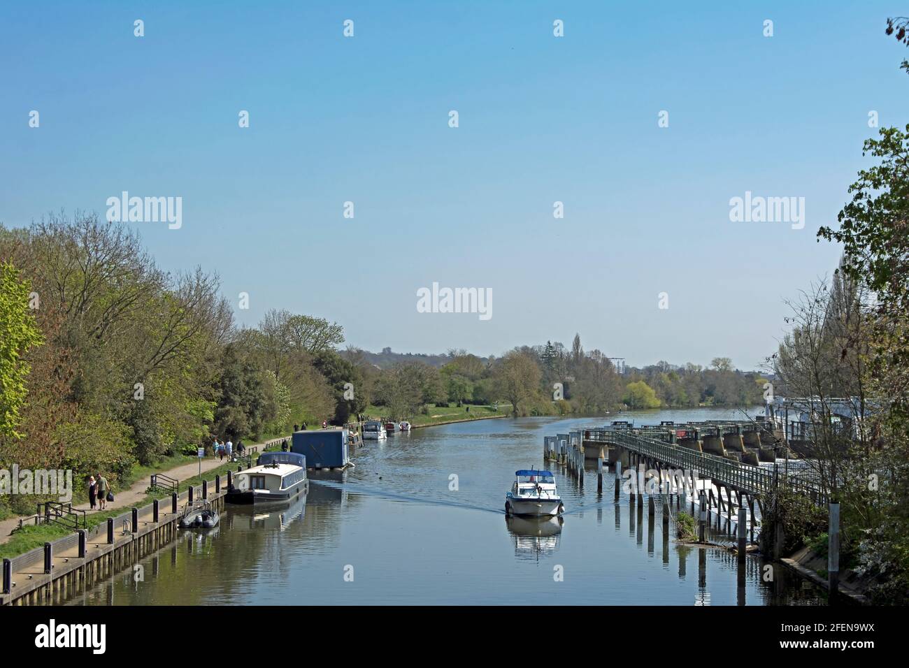looking south over the river thames from teddington bridge, with ...