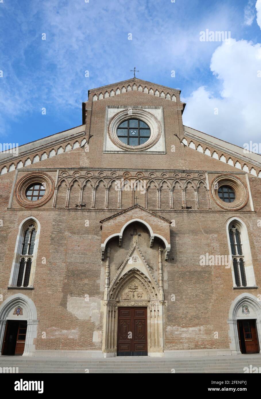 large facade of the cathedral in the city of Udine in northern Italy ...