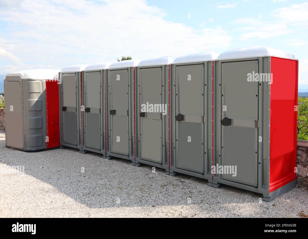 series of many chemical toilets in the open area and a large cabin also ...