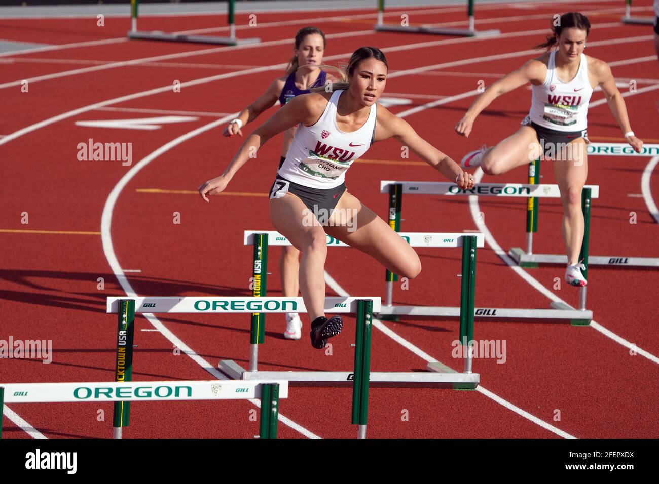 Stephanie Cho of Washington State wins the women's 400m hurdles in 59. ...