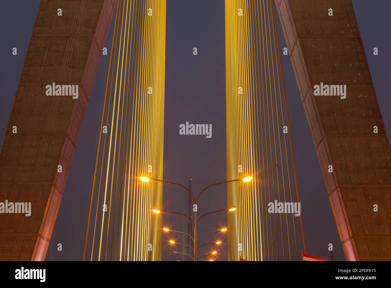 Lighting on the bridge, a long row of lamps along the street Stock ...