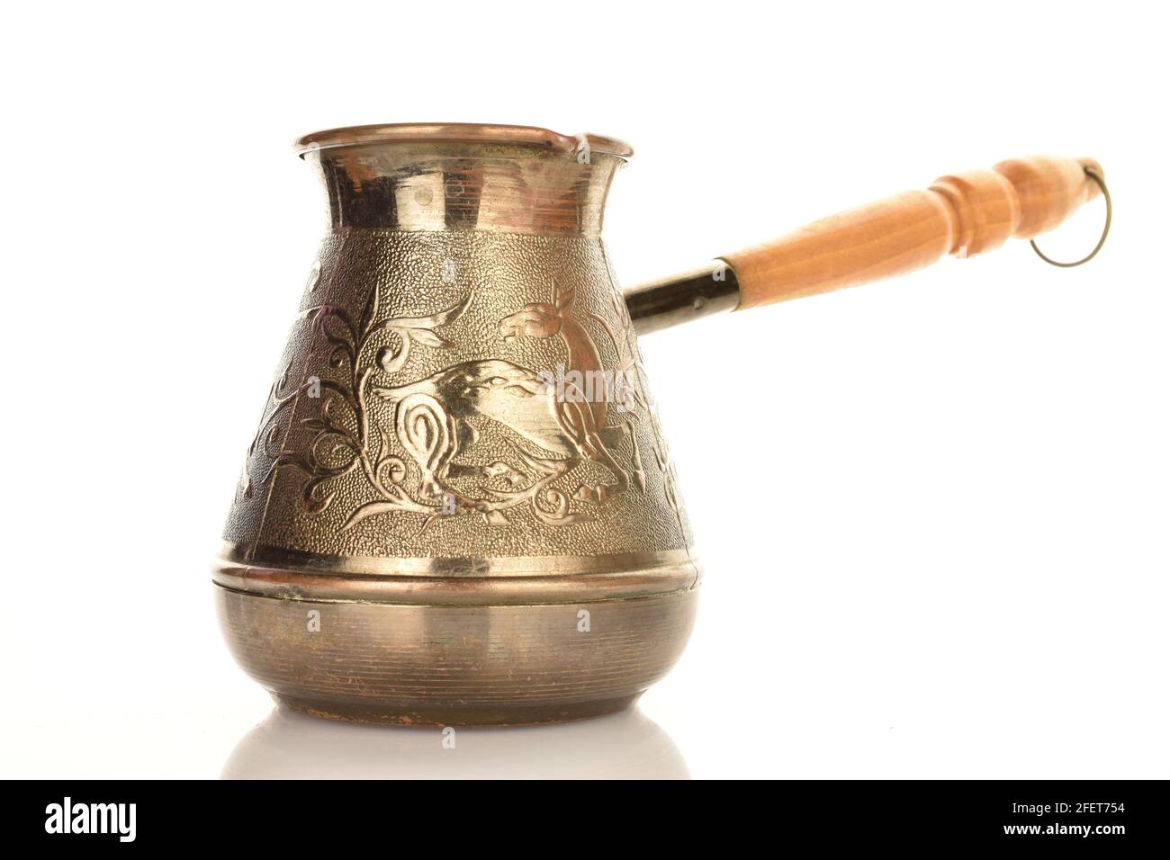 One copper cezve with wooden handle, close-up, isolated on white Stock ...