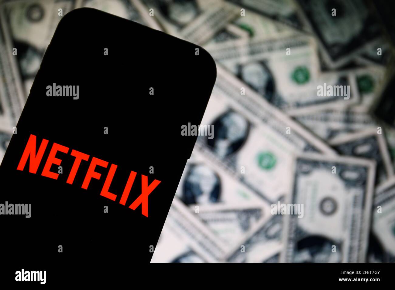 In this photo illustration a Netflix online streaming company app logo ...