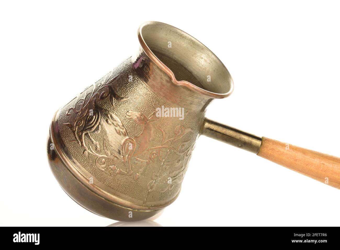 One copper cezve with wooden handle, close-up, isolated on white Stock ...