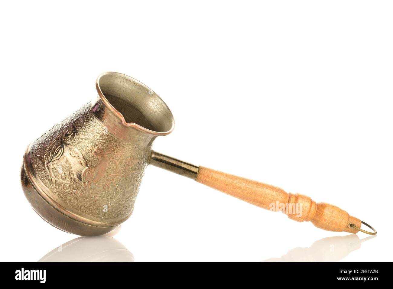 One copper cezve with wooden handle, close-up, isolated on white Stock ...