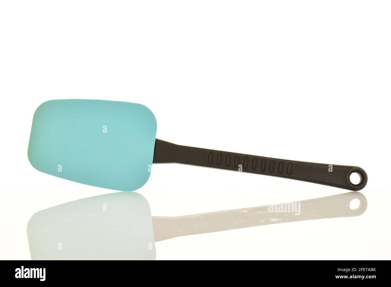 One silicone spatula, for the kitchen, close-up, isolated on white ...