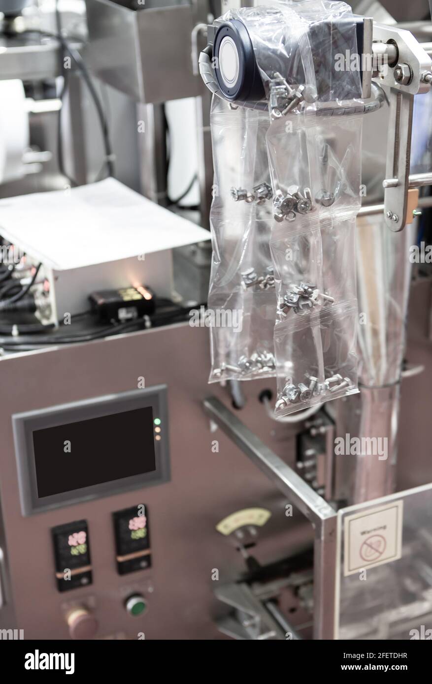 Automatic vertical hardware product nut and screw filling and packing ...