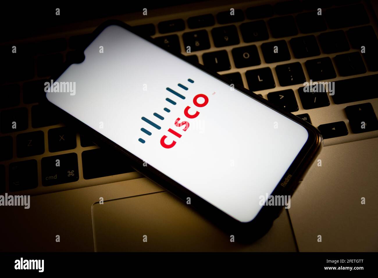 In this photo illustration, a Cisco logo seen displayed on a smartphone ...