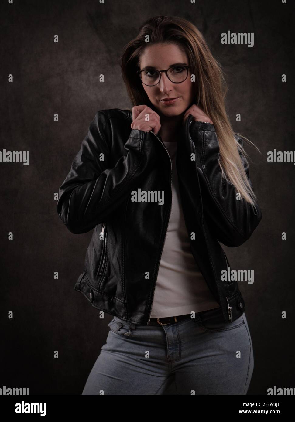 Attractive young woman poses for the camera Stock Photo - Alamy