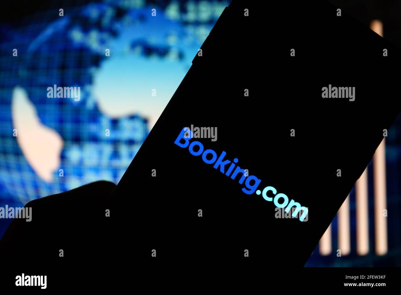 In this photo illustration a Booking.com app logo seen displayed on a ...