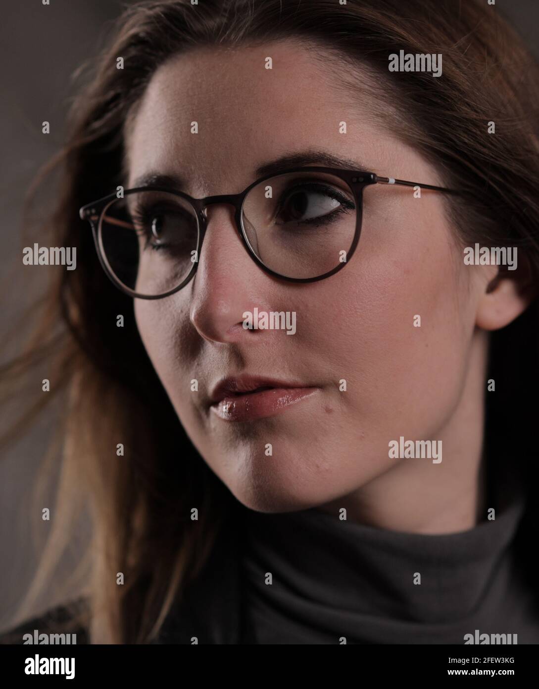 Beautiful girl with long brown hair - close-up shot Stock Photo - Alamy