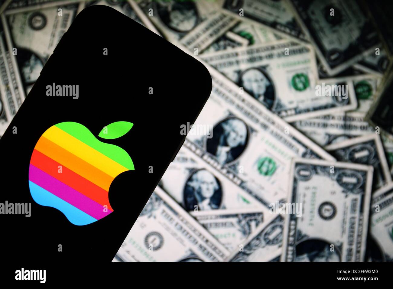 In this photo illustration an Apple technology company app logo seen ...