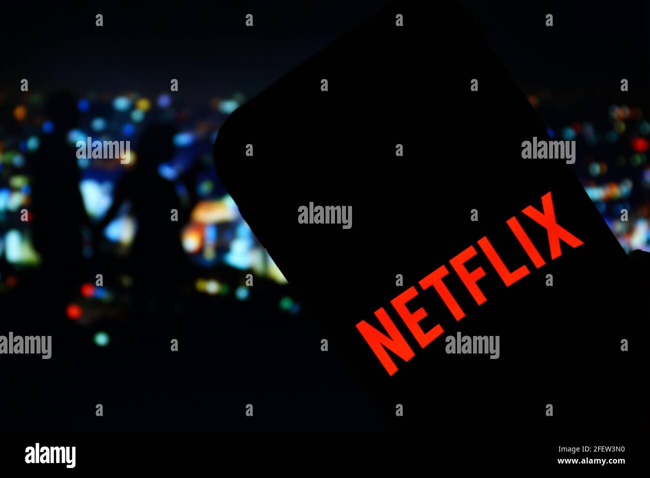 In this photo illustration a Netflix online streaming company app logo ...