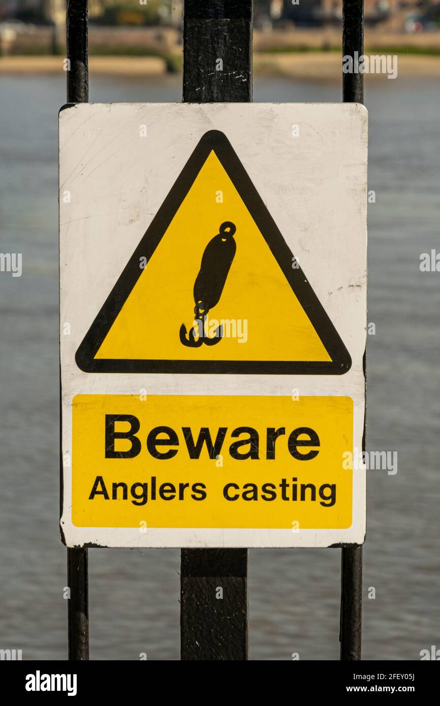 Beware Anglers Casting Warning Sign on a river bank Stock Photo - Alamy