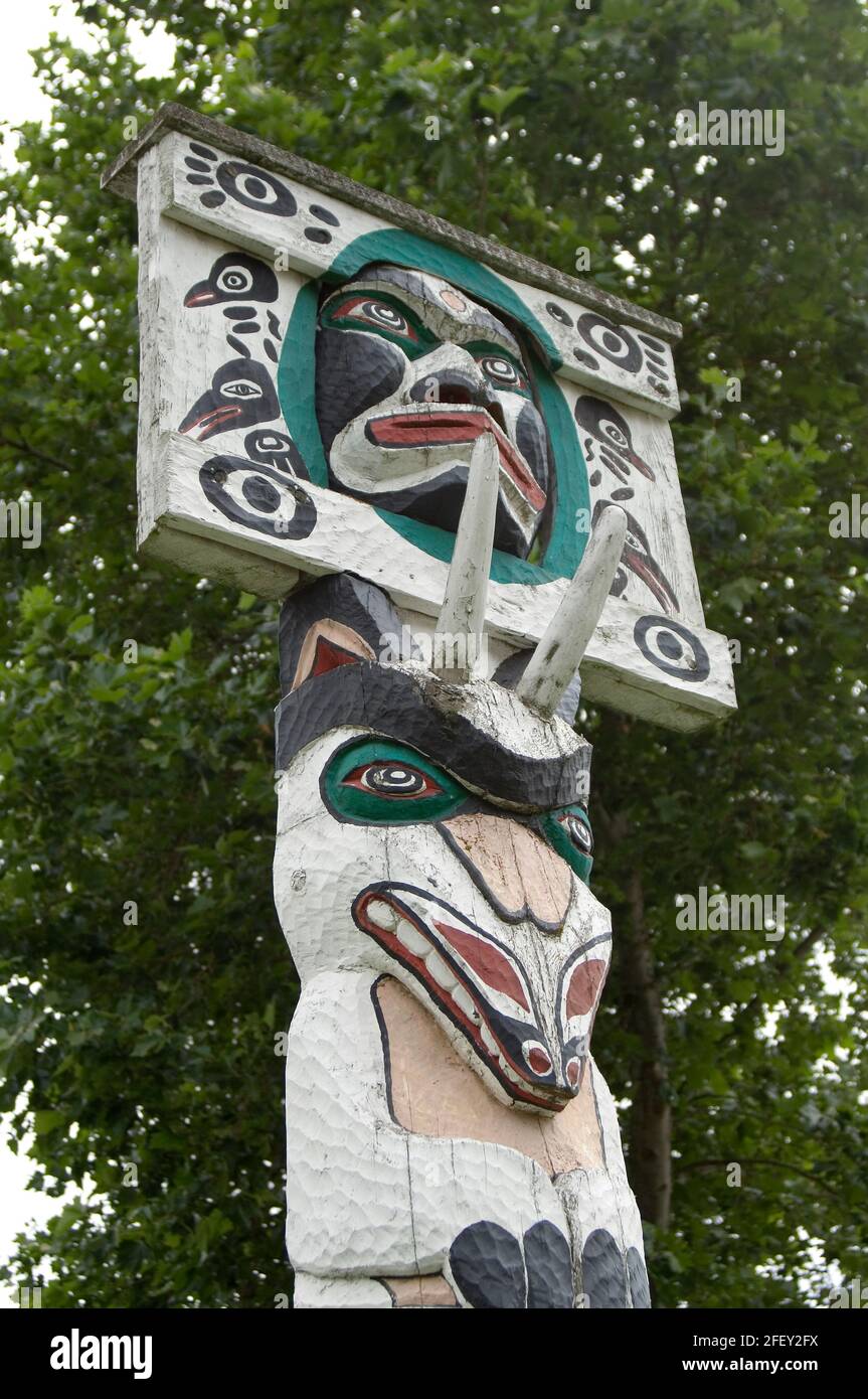 Moon with Human Spirit Face above Mountain Goat above Bear Holding ...