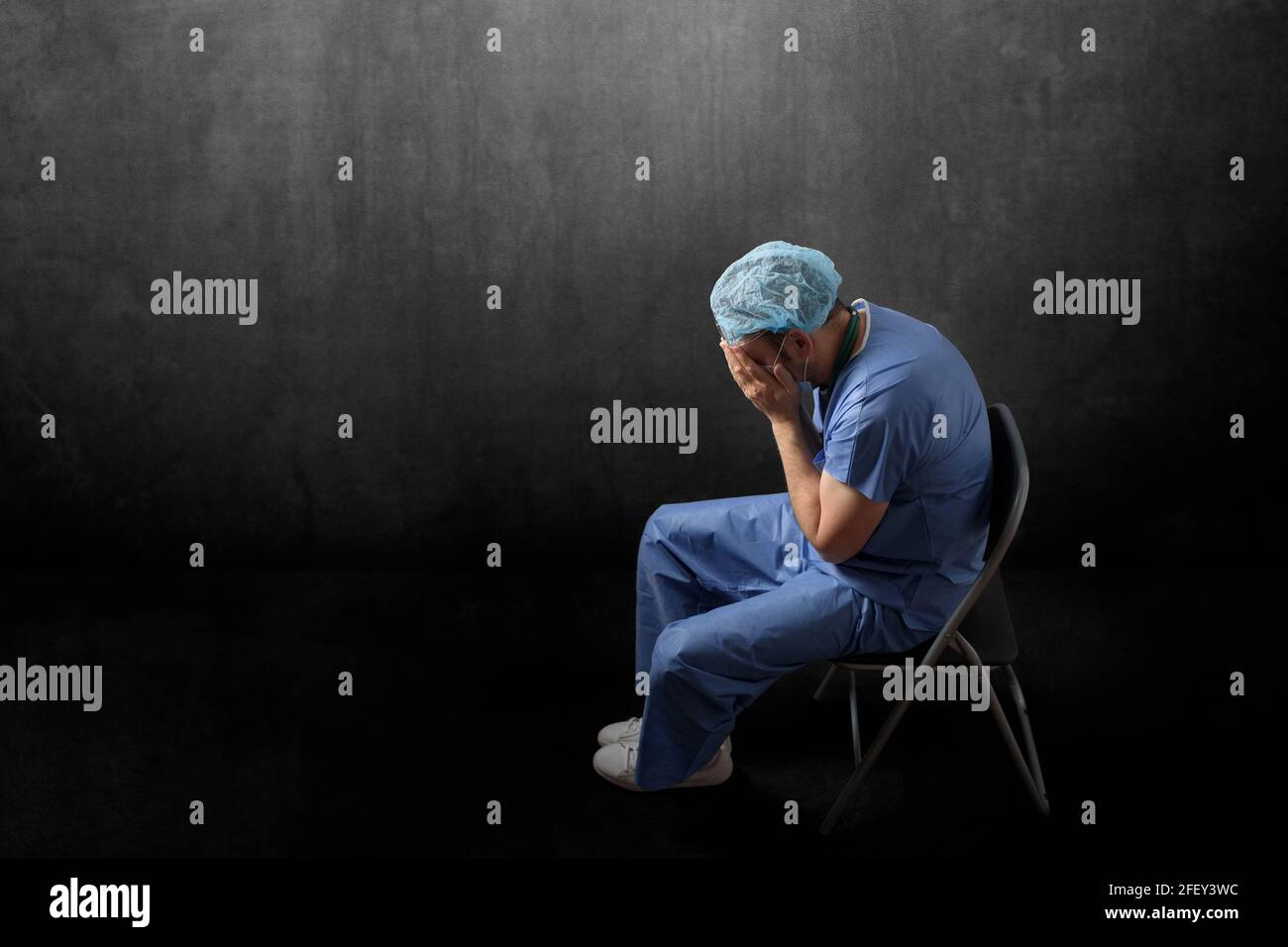 Portrait exhausted doctor in uniform hi-res stock photography and ...