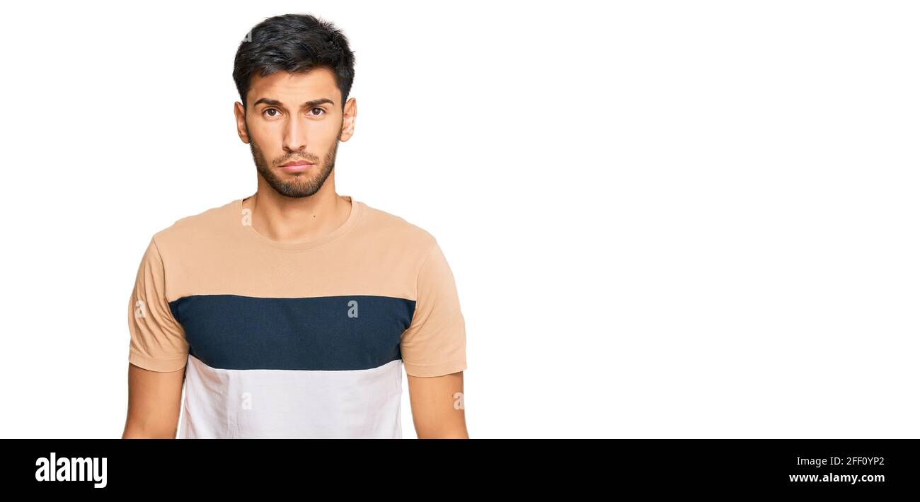 Young handsome man wearing casual clothes depressed and worry for ...