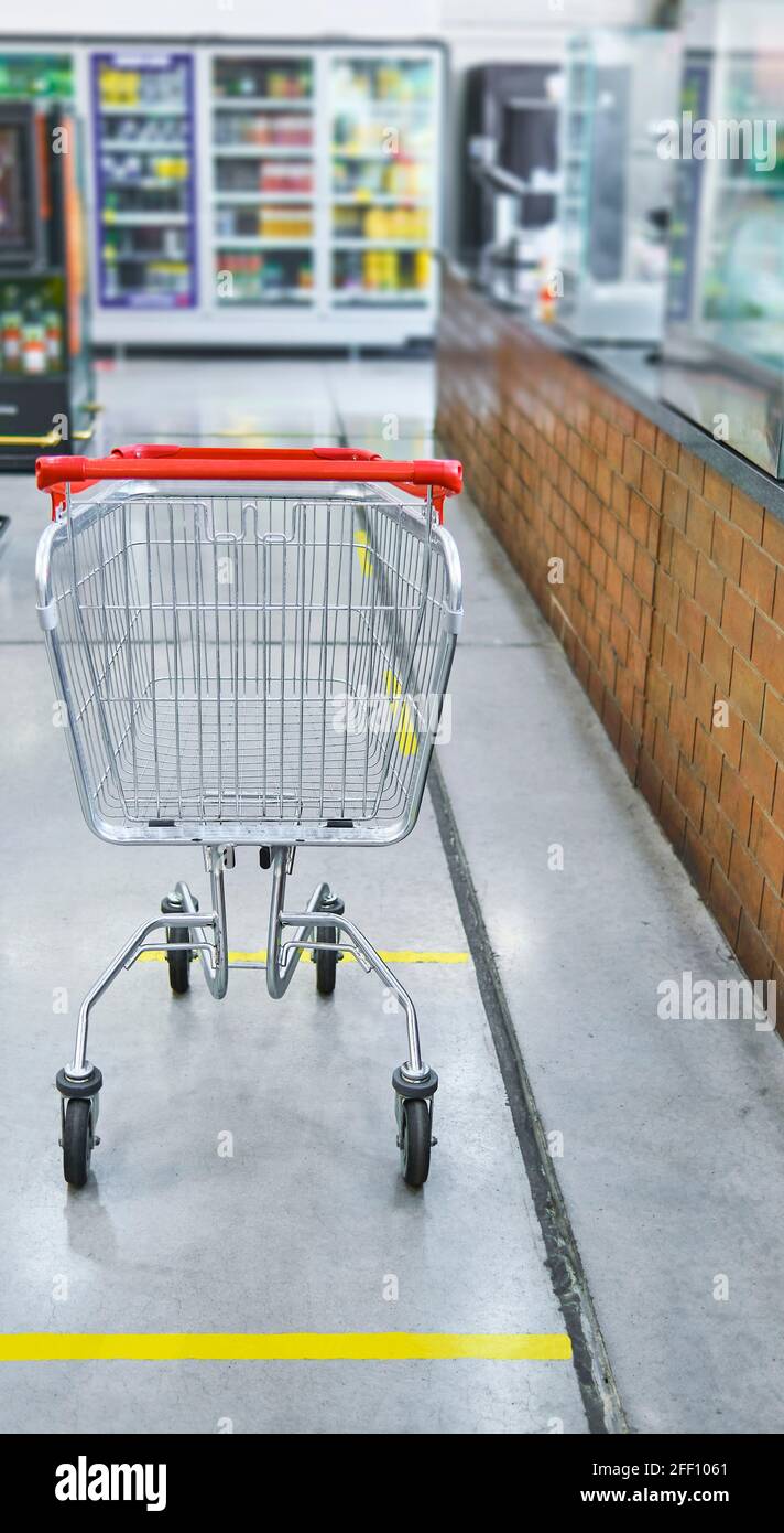 View from shopping cart trolley basket at supermarket self-service ...
