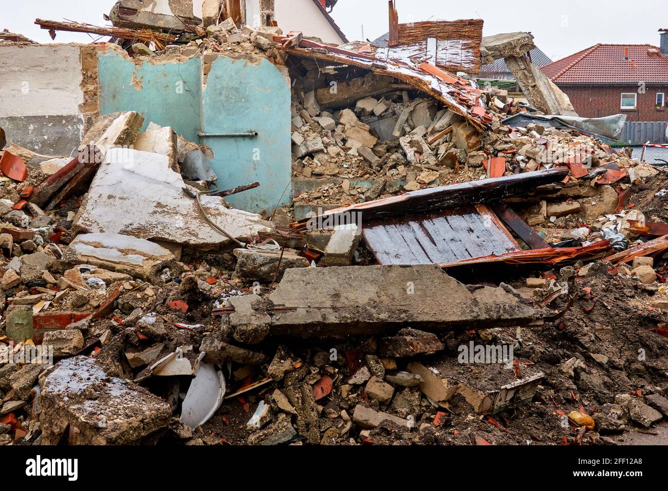 Remains of a residential building after a disorderly and non-selective ...