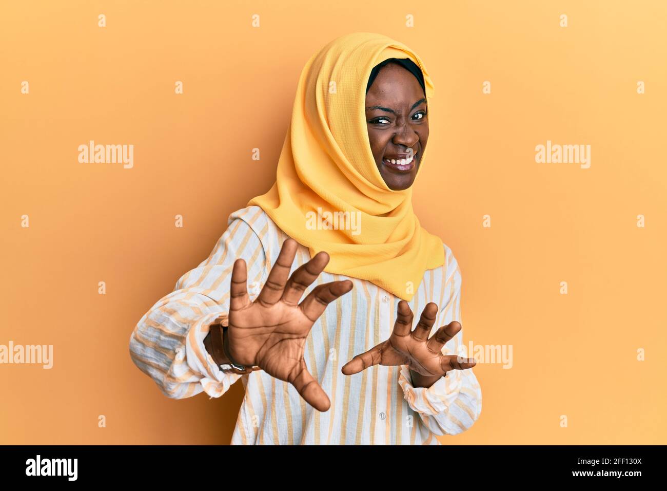 Beautiful african young woman wearing traditional islamic hijab scarf ...