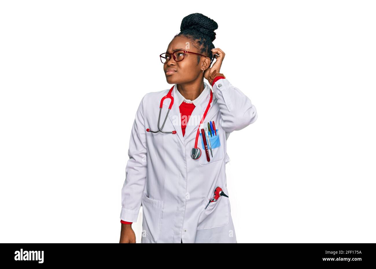 Young african american woman wearing doctor uniform and stethoscope ...