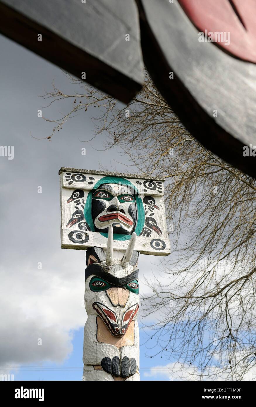 Moon with Human Spirit Face above Mountain Goat above Bear Holding ...