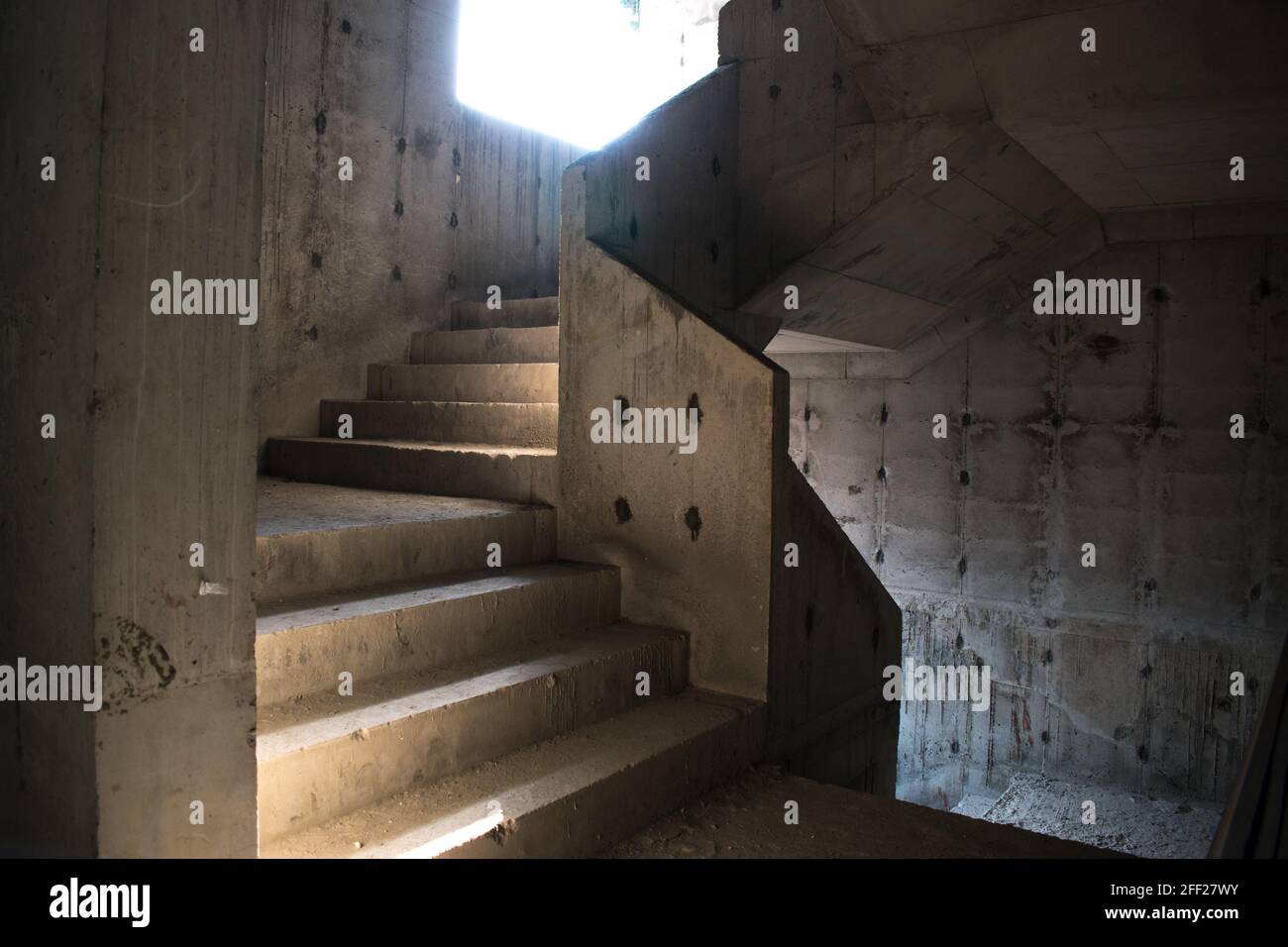 concrete stairs with sunlight and shadow at construction site Stock ...