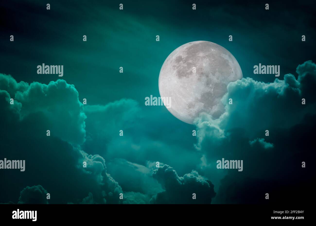 Attractive photo of a nighttime green sky with clouds, bright full moon ...