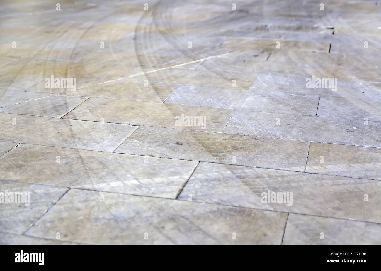 Wheel tracks on urban street, vehicle skidding, texture Stock Photo - Alamy