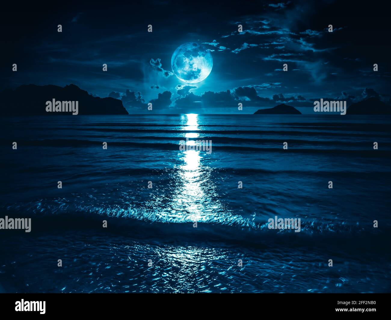 Super moon. Colorful sky with bright full moon over seascape. Serenity ...