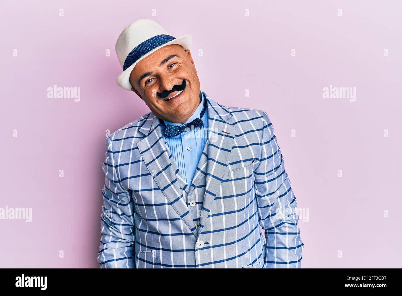 Mature middle east man with mustache wearing vintage and elegant ...