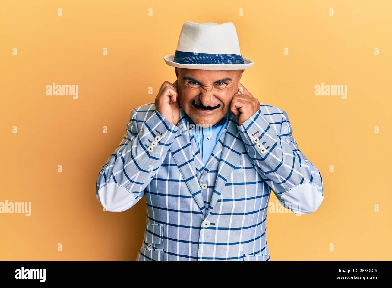 Mature middle east man with mustache wearing vintage and elegant ...