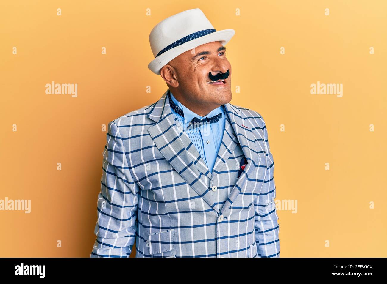 Mature middle east man with mustache wearing vintage and elegant ...