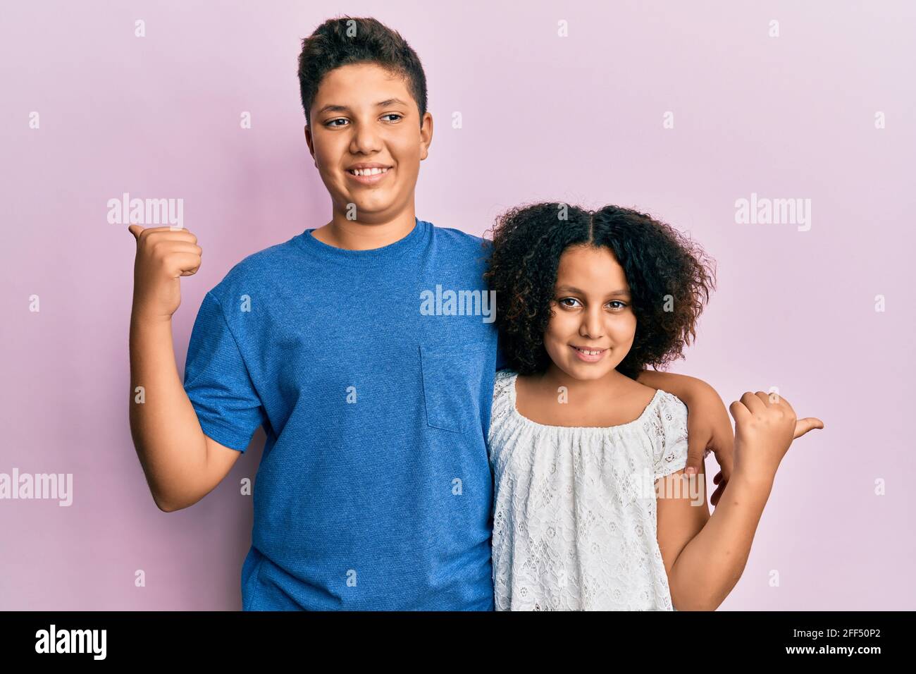 Young hispanic family of brother and sister wearing casual clothes ...